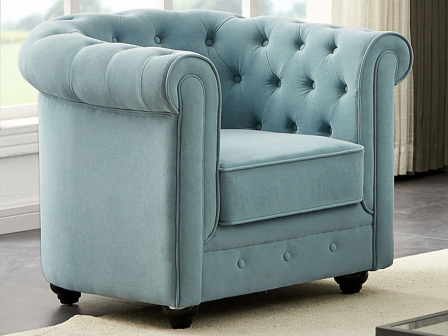Fauteuil en tissu bleu clair forme mythique CHESTERFIELD