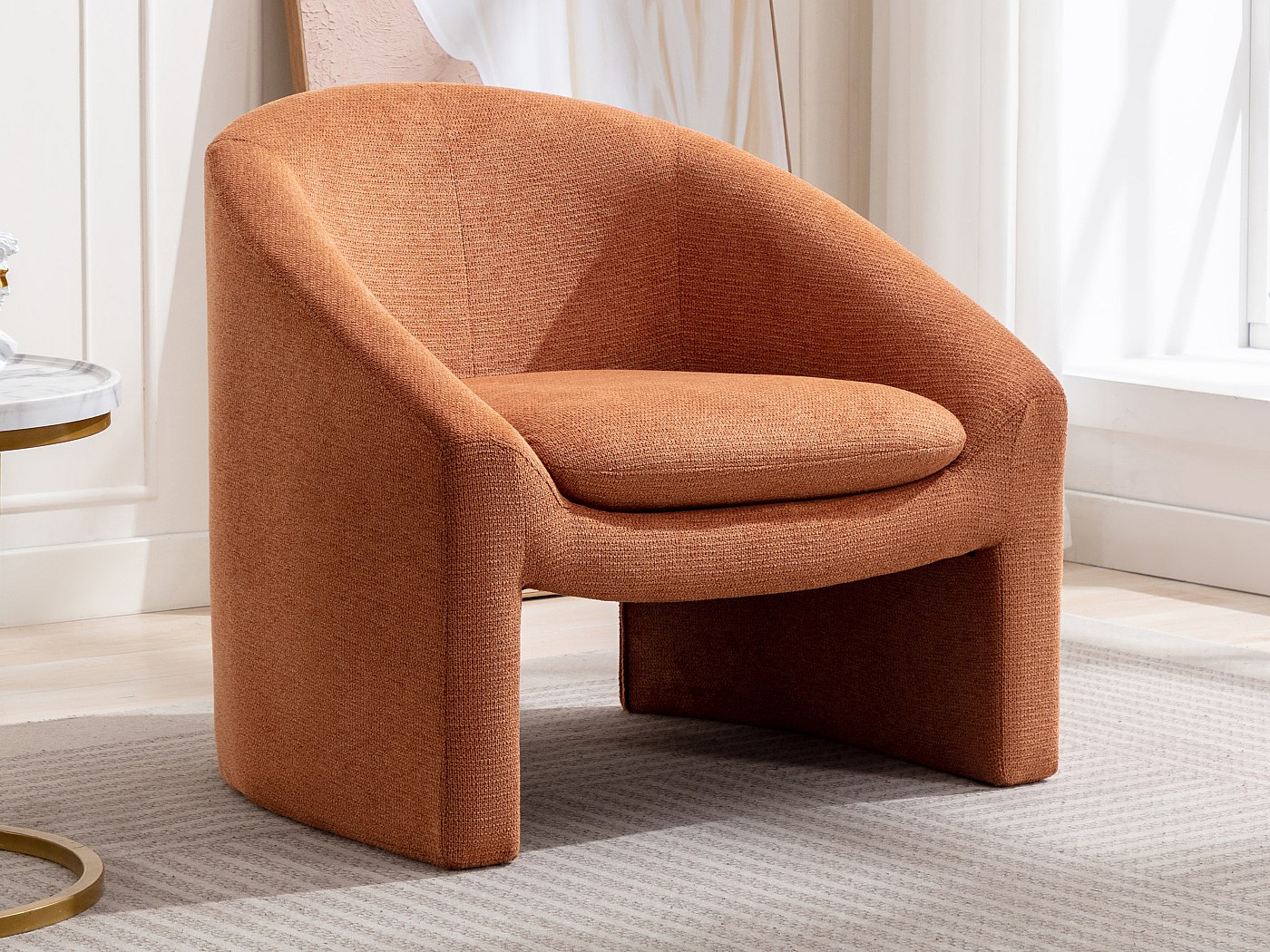 Fauteuil van terracottakleurige stof met textuur met designstijl OSSANA