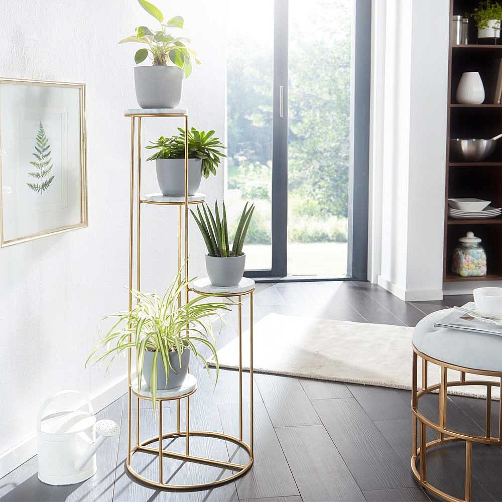 Pflanzens ule aus Metall in Gooldfarben Marmorplatten